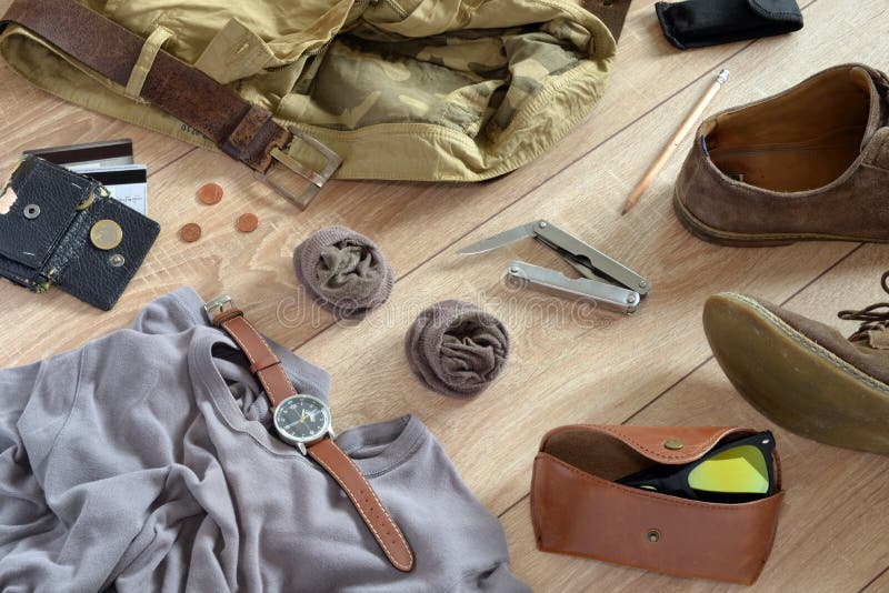 Sand-colored Clothes Lie on the Wooden Floor. Stock Photo - Image of ...