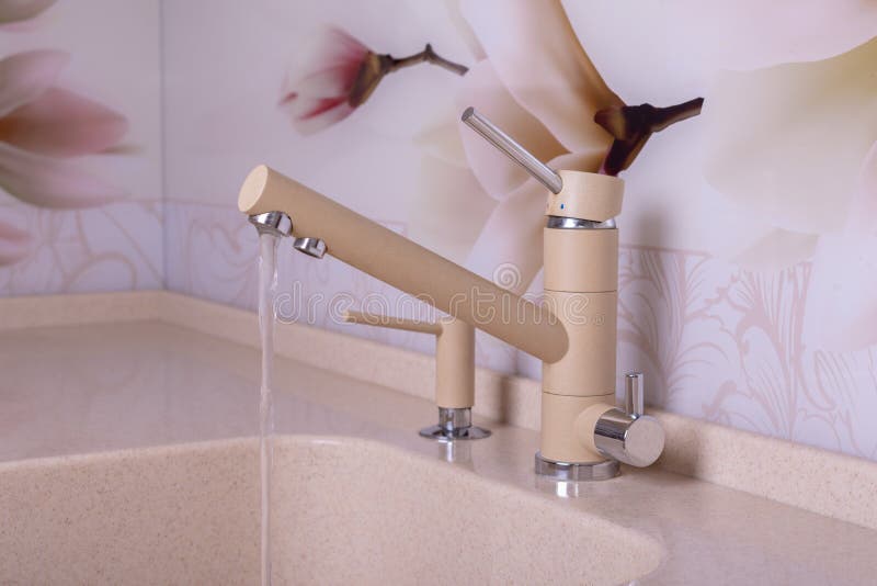 Sand-colored Kitchen Faucet from Which Cold Water Flows Stock Photo ...