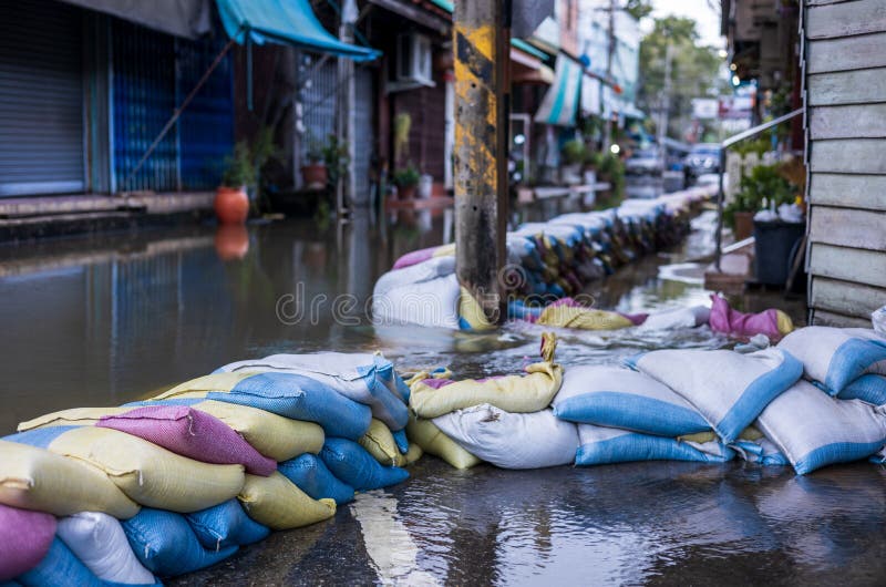 The Sand Contained within Colorful Sacks is Stacked in a Long Line To ...