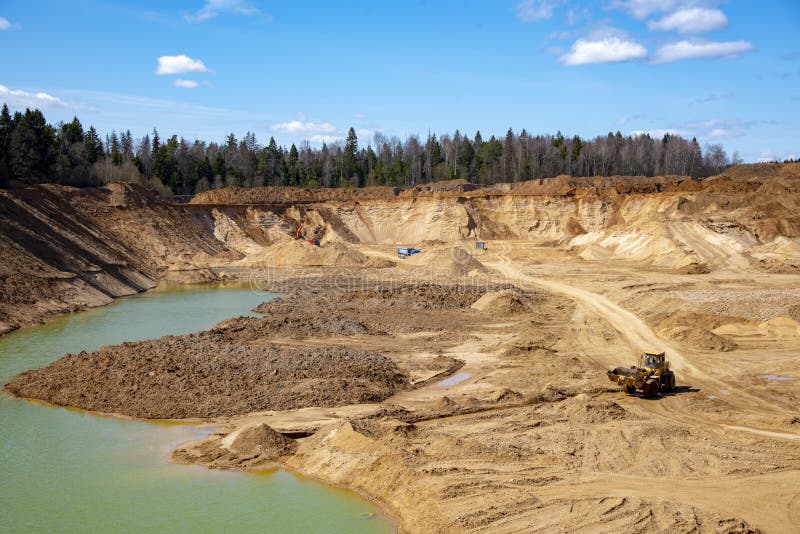 Sand Deep Quarry Under a Blue Cloudy Sky Editorial Stock Image - Image ...