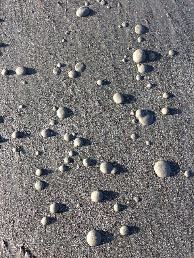 Sand drops on the beach stock photo. Image of drops, blobs - 83171014