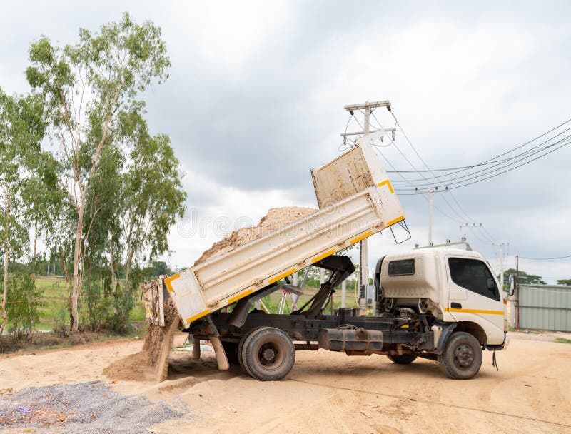 Sand Dump Trucks at the Construction Site Stock Image - Image of dirt ...