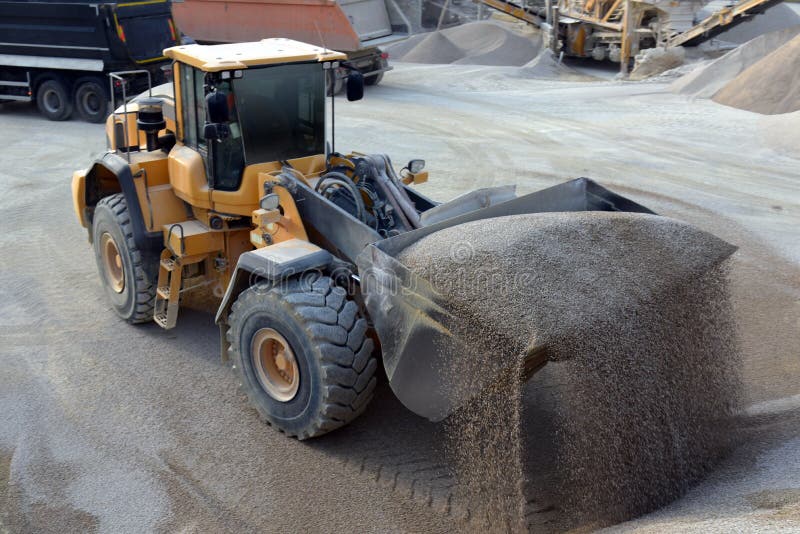 Wheel Loader Excavator Unloading Sand Stock Image - Image of action ...