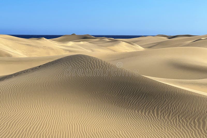 Sand Dune in Maspalomas, Gran Canaria. Sand Barkhan with a Wavy Pattern ...