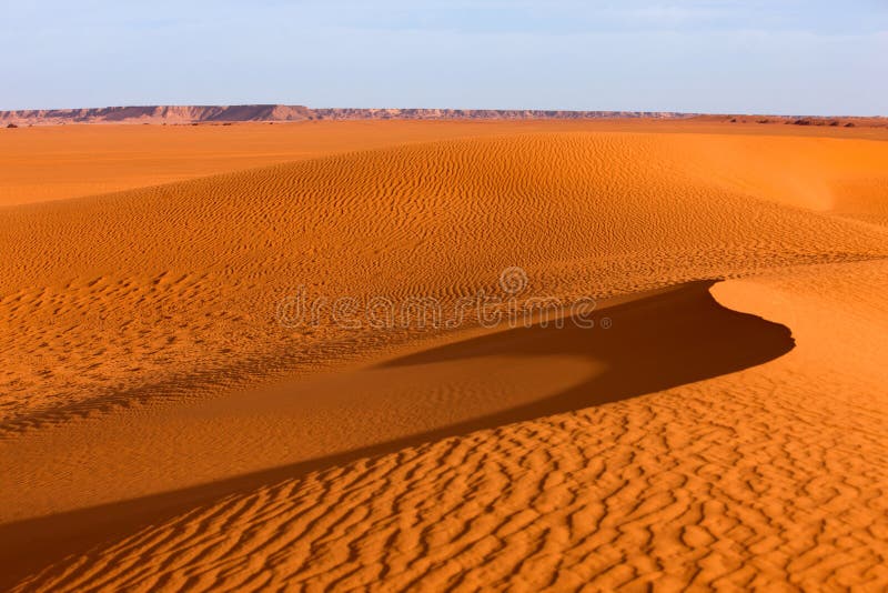 Blue sky and red sand stock photo. Image of activities - 1005216