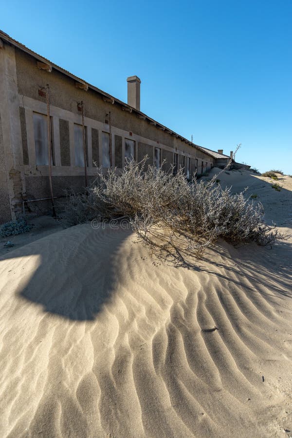 Sand dunes on ruins stock photo. Image of wave, town - 210331792