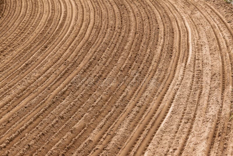 Sand-Erde gebogene Nuten stockfoto. Bild von ausbildung - 27888052
