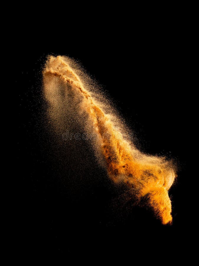 Sand Explosion Isolated on Black Background. Freeze Motion of Sandy ...