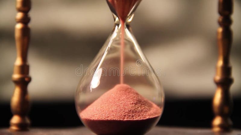 Sand Falling in the Hourglass - the Concept of Running Time Stock ...
