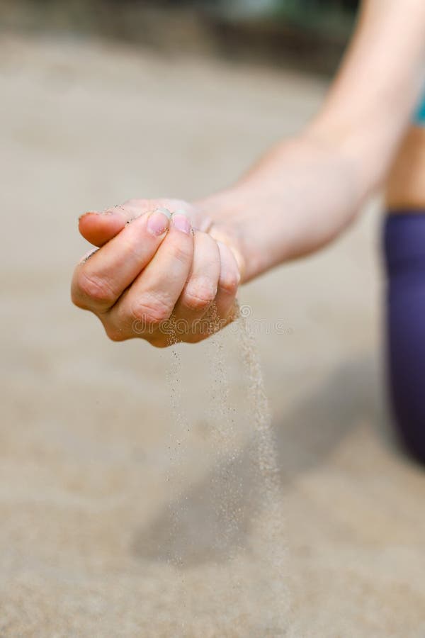 Sand Falling from Woman`s Hand. Vacation on the Beach Stock Photo ...