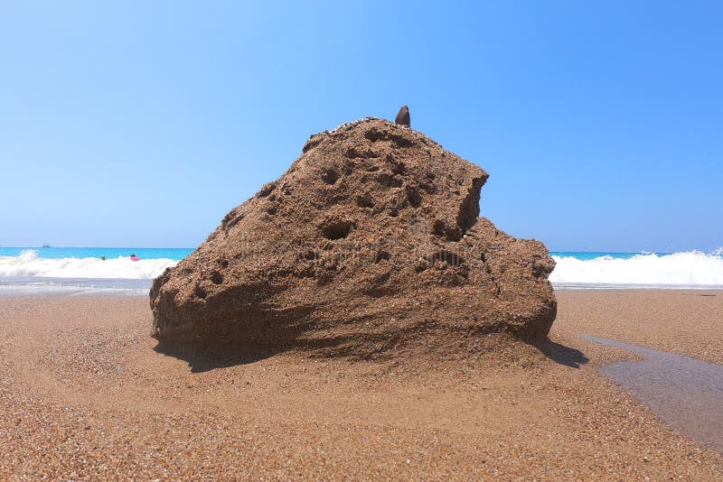 Sand figure on the beach stock image. Image of child - 154341693