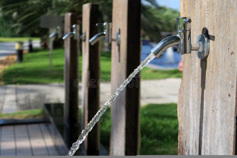 Sand flushing taps stock image. Image of faucet, flush - 57404519