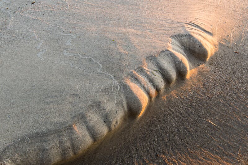 Sand formation at sunset stock image. Image of traces - 112056475