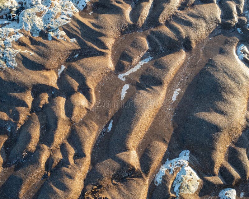 Sand Formations on the Beach at Sunset Stock Photo - Image of detail ...