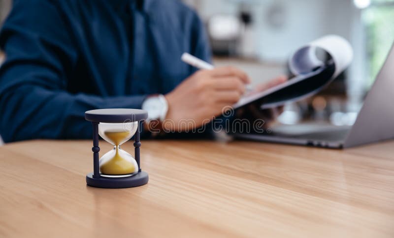 Sand Glass Put on Table in Front of Businessman Stock Image - Image of ...