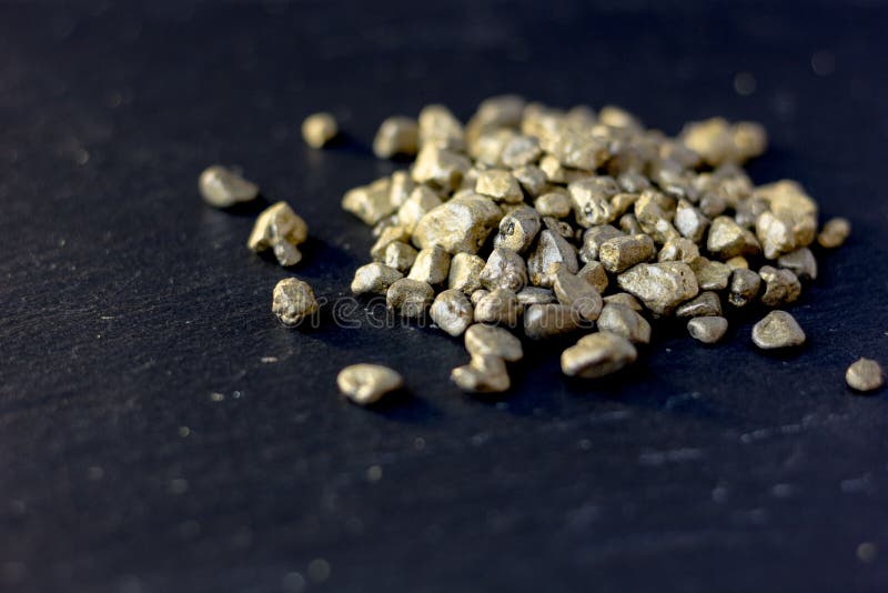 Sand of Gold at Black Stone Board Stock Image - Image of attractive ...