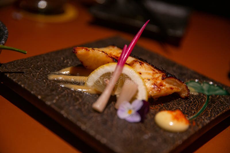 Sand Grilled Cod Fish stock image. Image of candle, butter - 374699975