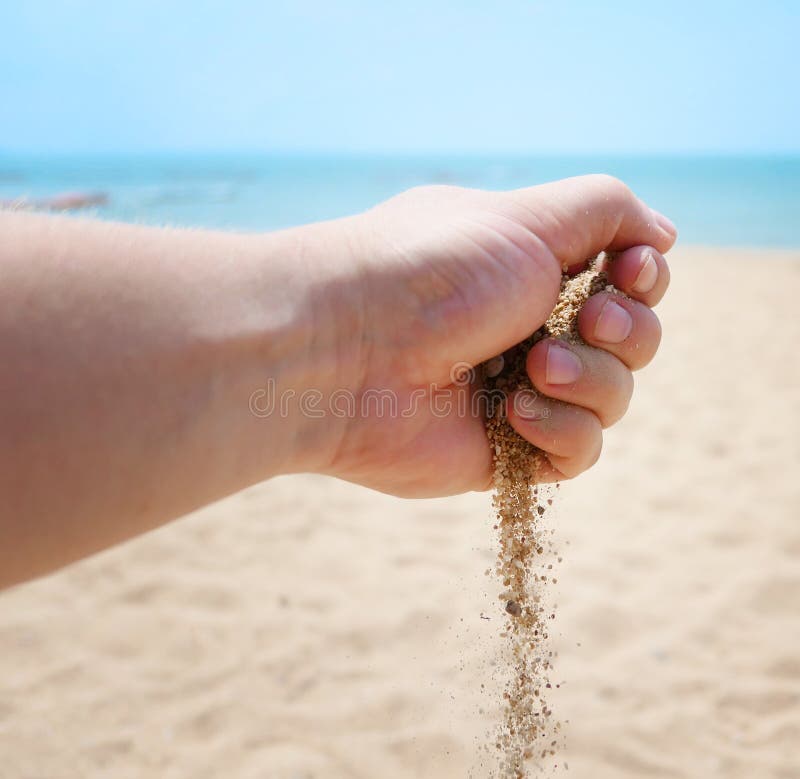 Sand in hand stock photo. Image of human, seascape, brown - 113173138