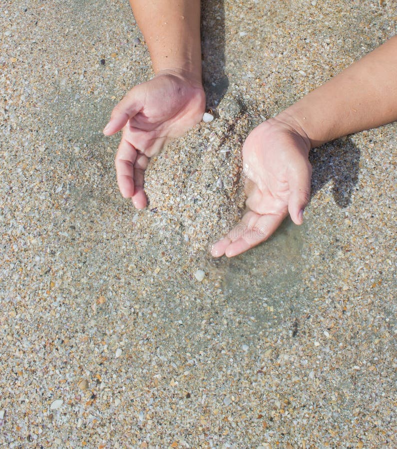Sand in hand stock image. Image of human, grain, hands - 54841845