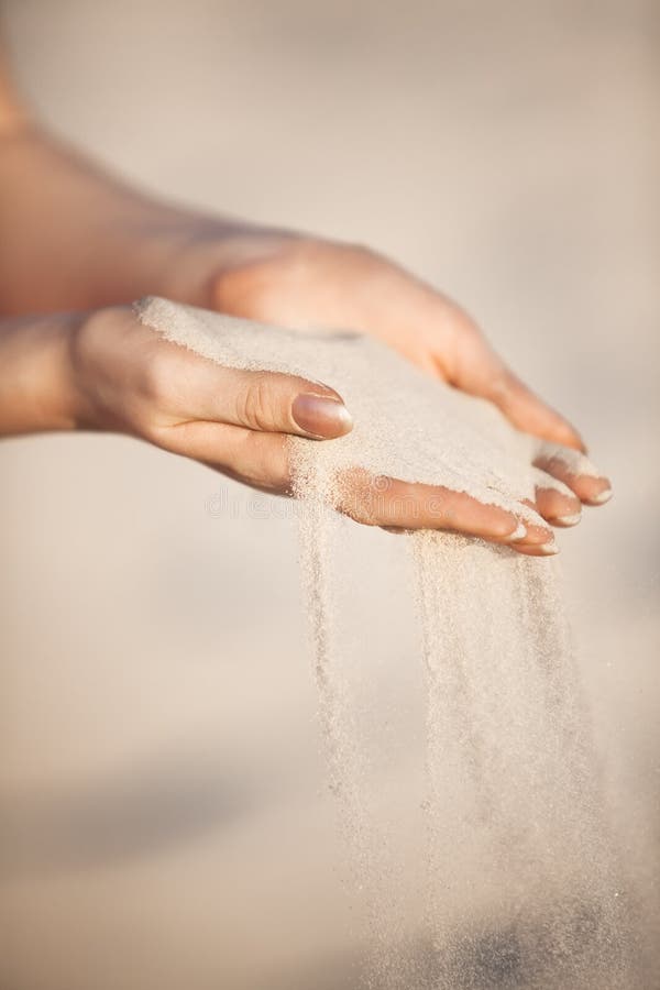 Hand Dropping Sand with Blue Sky Stock Photo - Image of beauty, grain ...