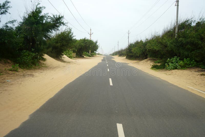 Sand in highway at Odisha stock photo. Image of nature - 373768684