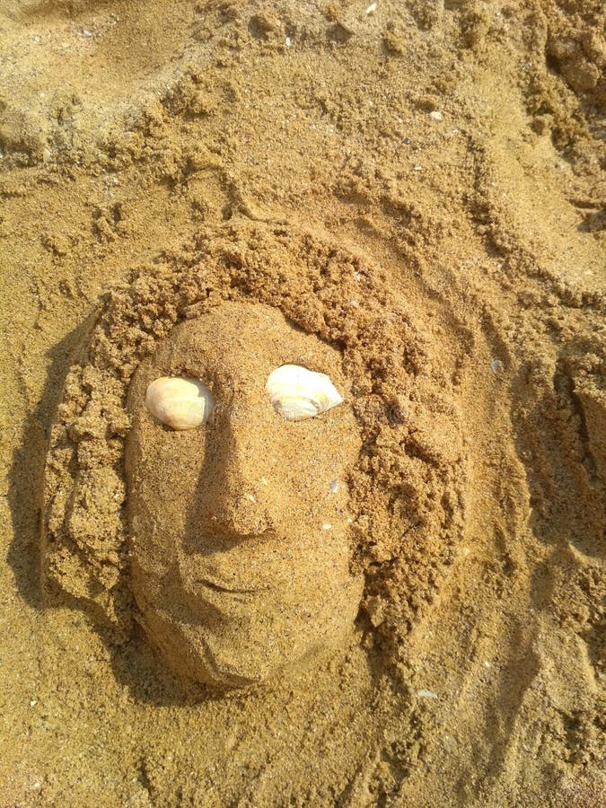 Sand lady with shells stock image. Image of figure, shells - 366960511