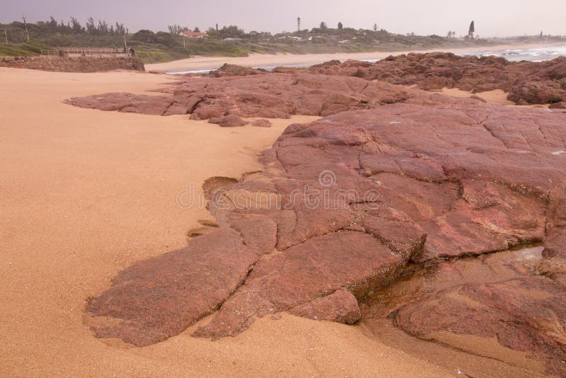 Sand and Large Rocks Line the Seashore Stock Photo - Image of vacation ...