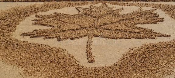 Sand Mandala with a Maple Leaf on the Beach Stock Photo - Image of ...