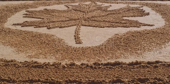 Sand Mandala with a Maple Leaf on the Beach Stock Photo - Image of ...