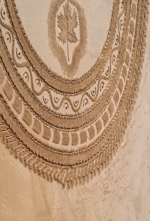 Sand Mandala with a Maple Leaf on the Beach Stock Photo - Image of ...