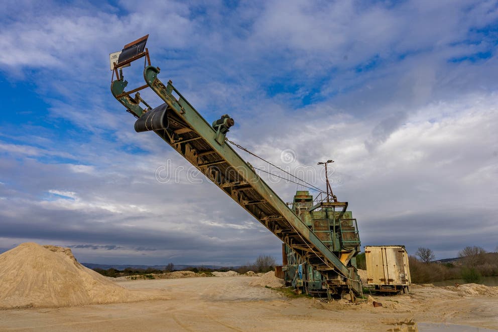 Sand Mining Machine stock photo. Image of water, clouds - 361997644