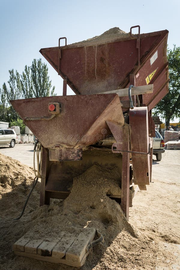 Sand packing equipment stock photo. Image of metal, construction - 98673494