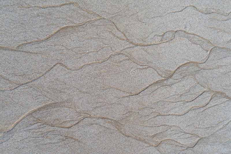Sand pattern on the beach stock photo. Image of line - 135052678