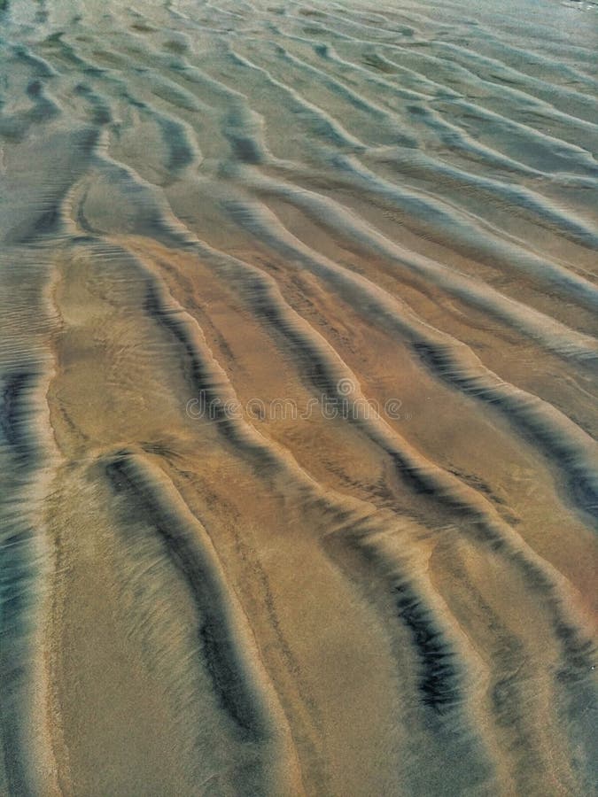 Sand pattern in beach stock image. Image of dawn, pattern - 164984883