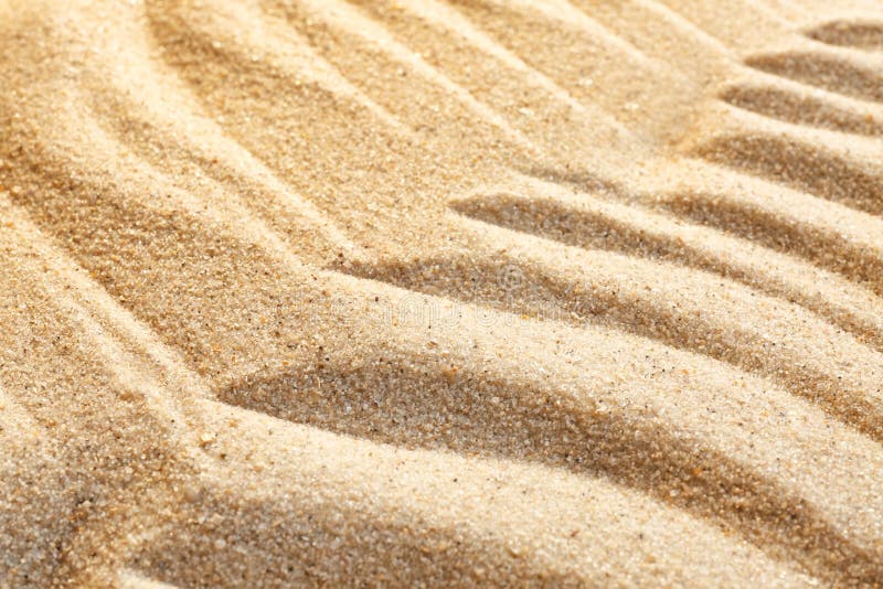 Sand with pattern, closeup stock photo. Image of clean - 150076702
