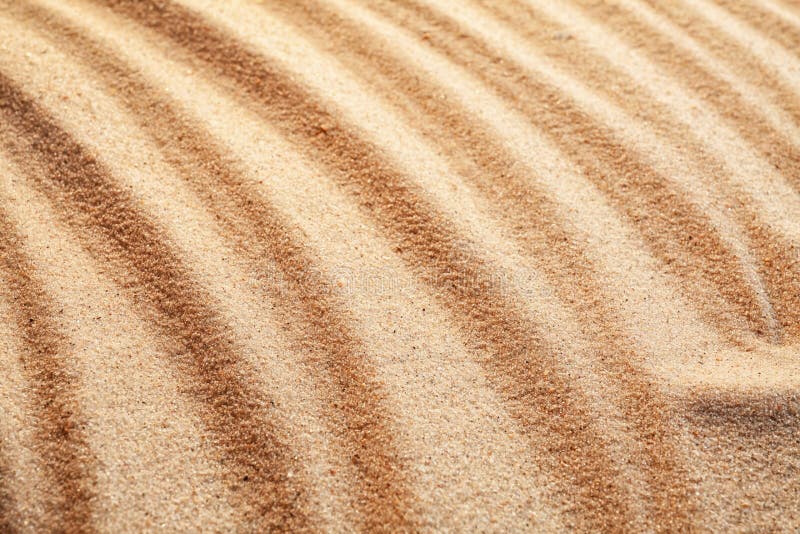 Sand with pattern, closeup stock photo. Image of pile - 150076726