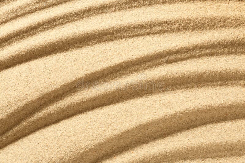 Sand with pattern, closeup stock photo. Image of grain - 150076728