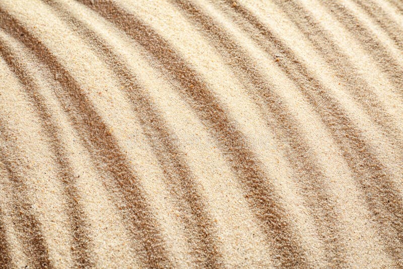 Sand with pattern, closeup stock image. Image of grit - 150076905