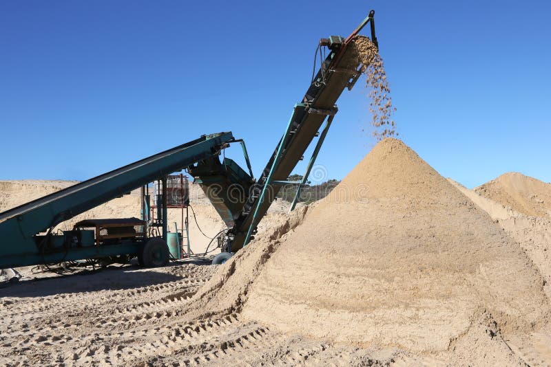 Sand Pile and Screening Machine Stock Photo - Image of machinery, blue ...