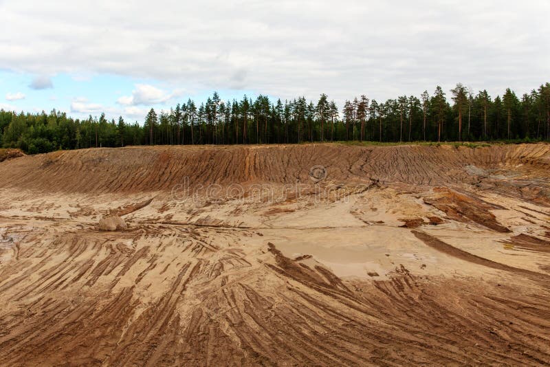 Sand pit in a pine forest stock photo. Image of construction - 97993402