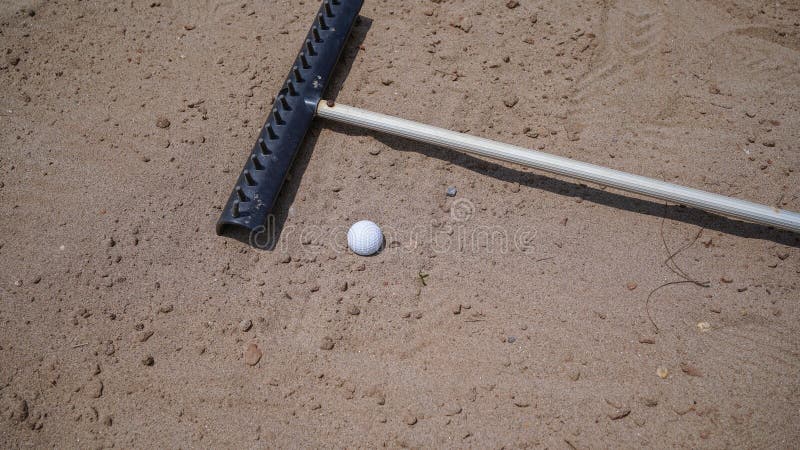 Sand Pit with Sanding Equipment in Golf Course Sand Bunker Stock Photo ...