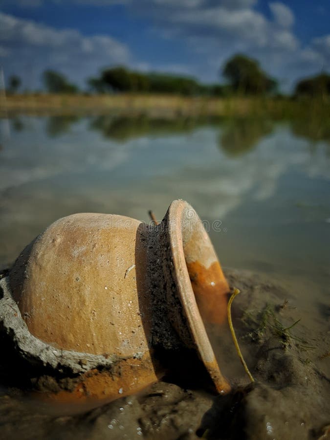 Sand pot in mud stock photo. Image of lake, water, sand - 239767404