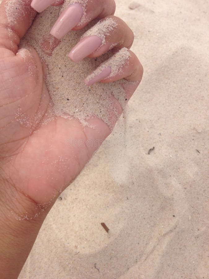 Sand pouring from hand stock photo. Image of exotic, pour - 69966664