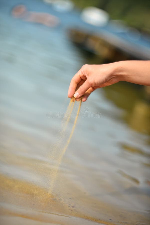 904 Hand Pouring Sand Photos - Free & Royalty-Free Stock Photos from ...