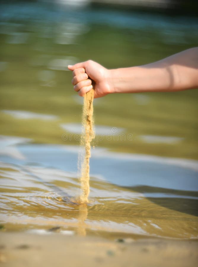 904 Hand Pouring Sand Photos - Free & Royalty-Free Stock Photos from ...