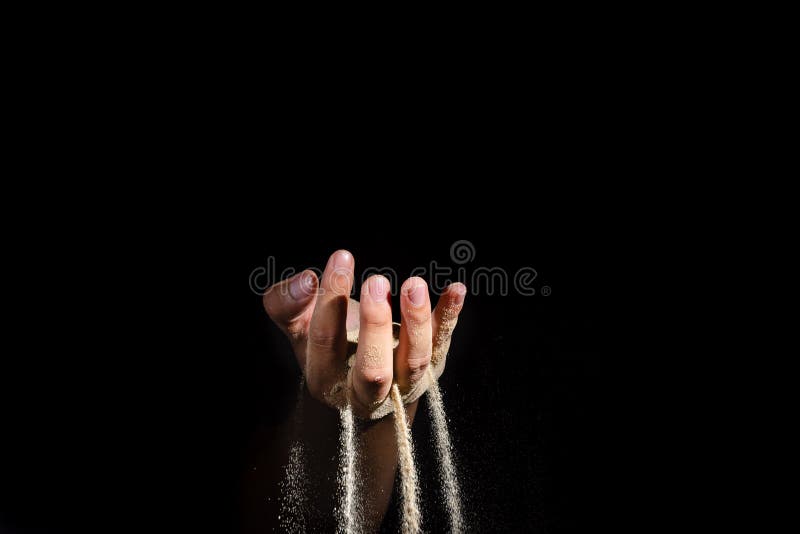 Sand Pouring Though between the Fingers Stock Image - Image of holding ...