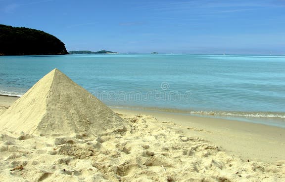 Sand pyramid on beach stock image. Image of egypt, play - 14654593
