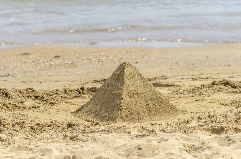 Sand Pyramid on the Beach by the Sea Stock Image - Image of design ...