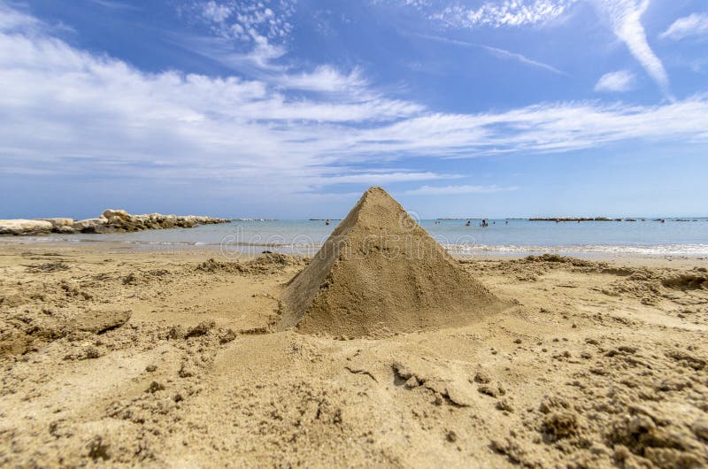 Sand Pyramid on the Beach by the Sea Stock Image - Image of dreams ...