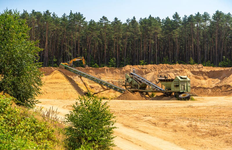 Sand Quarry and Mining Equipment in the Forest Stock Photo - Image of ...